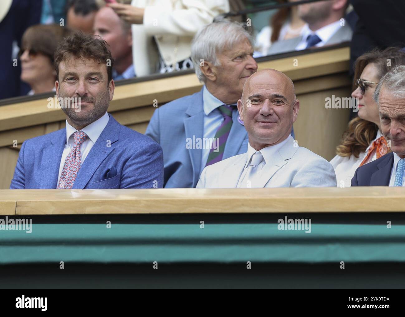 Andre Agassi and his friend Justin Gimelstob watching the action at the ...