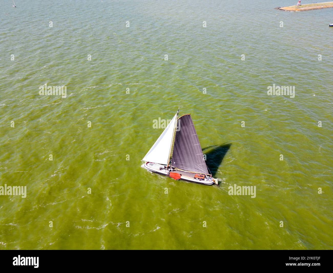 Traditional, flat-bottomed Frisian sailing ships in a yearly ...