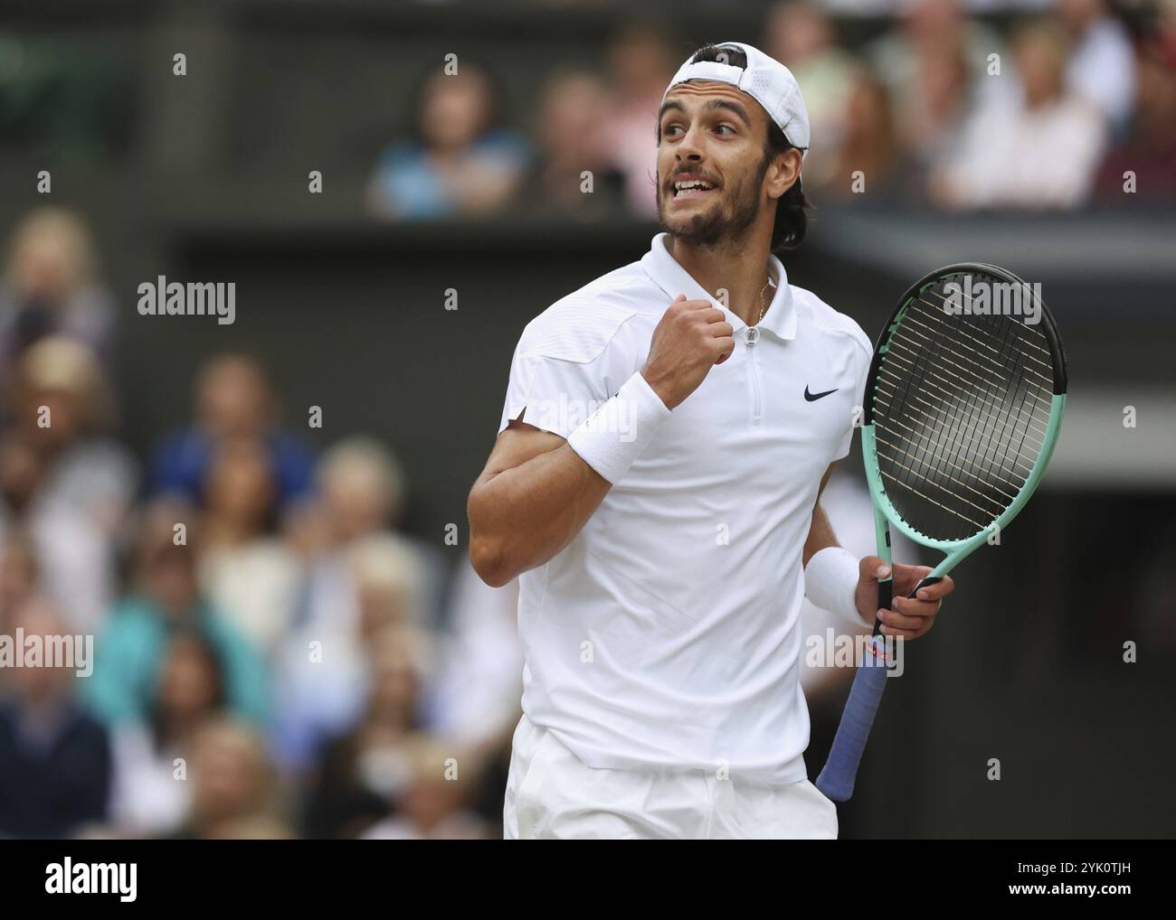 Italian tennis player Lorenzo Musetti celebrating at the 2024 Wimbledon ...