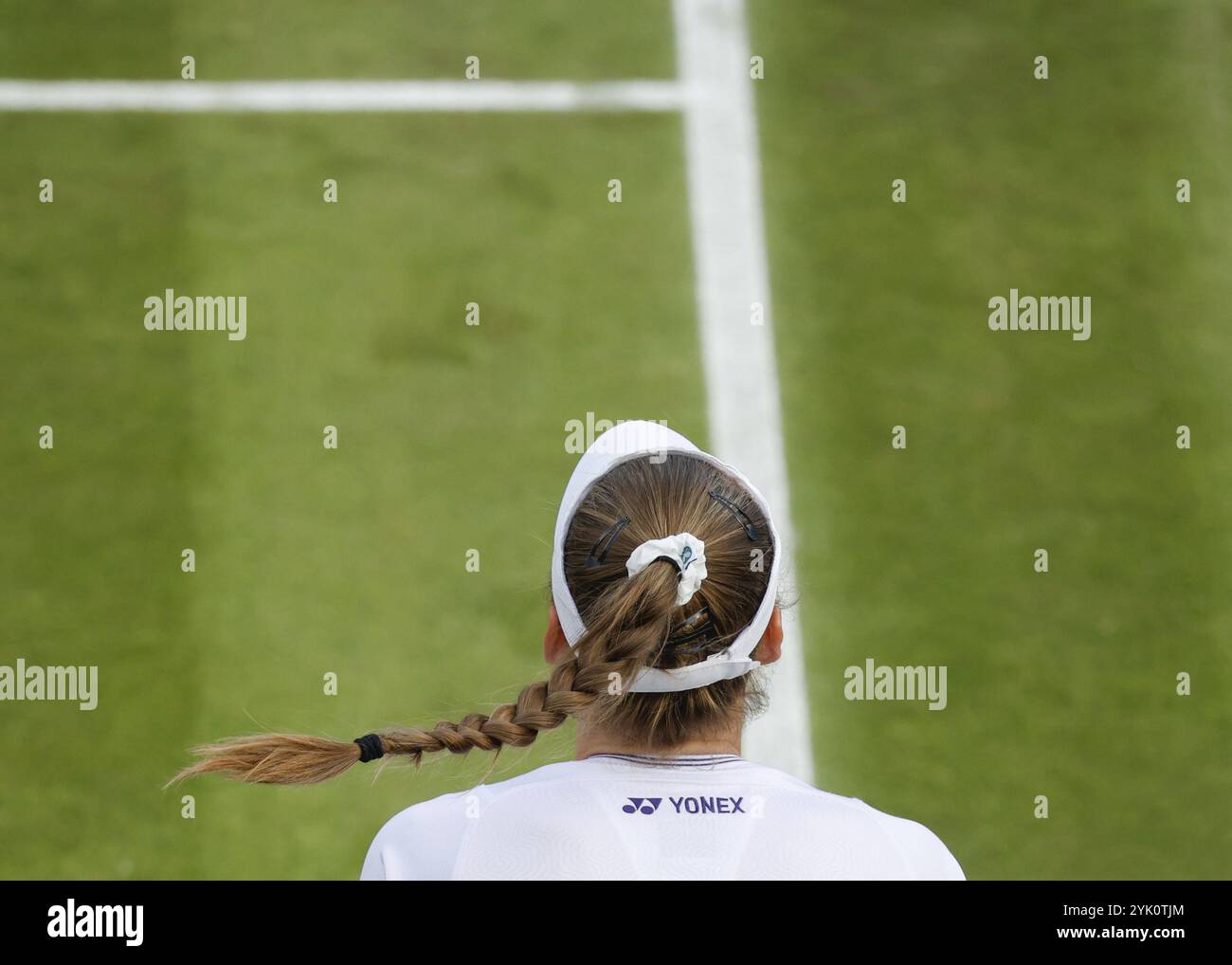 Rear view of Kazakh tennis player Elena Rybakina at the 2024 Wimbledon ...