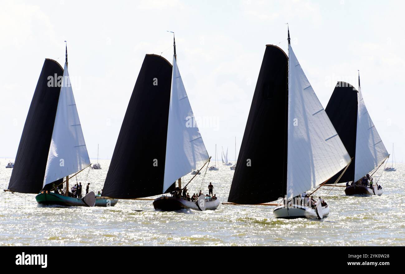 Traditional, flat-bottomed Frisian sailing ships in a yearly ...