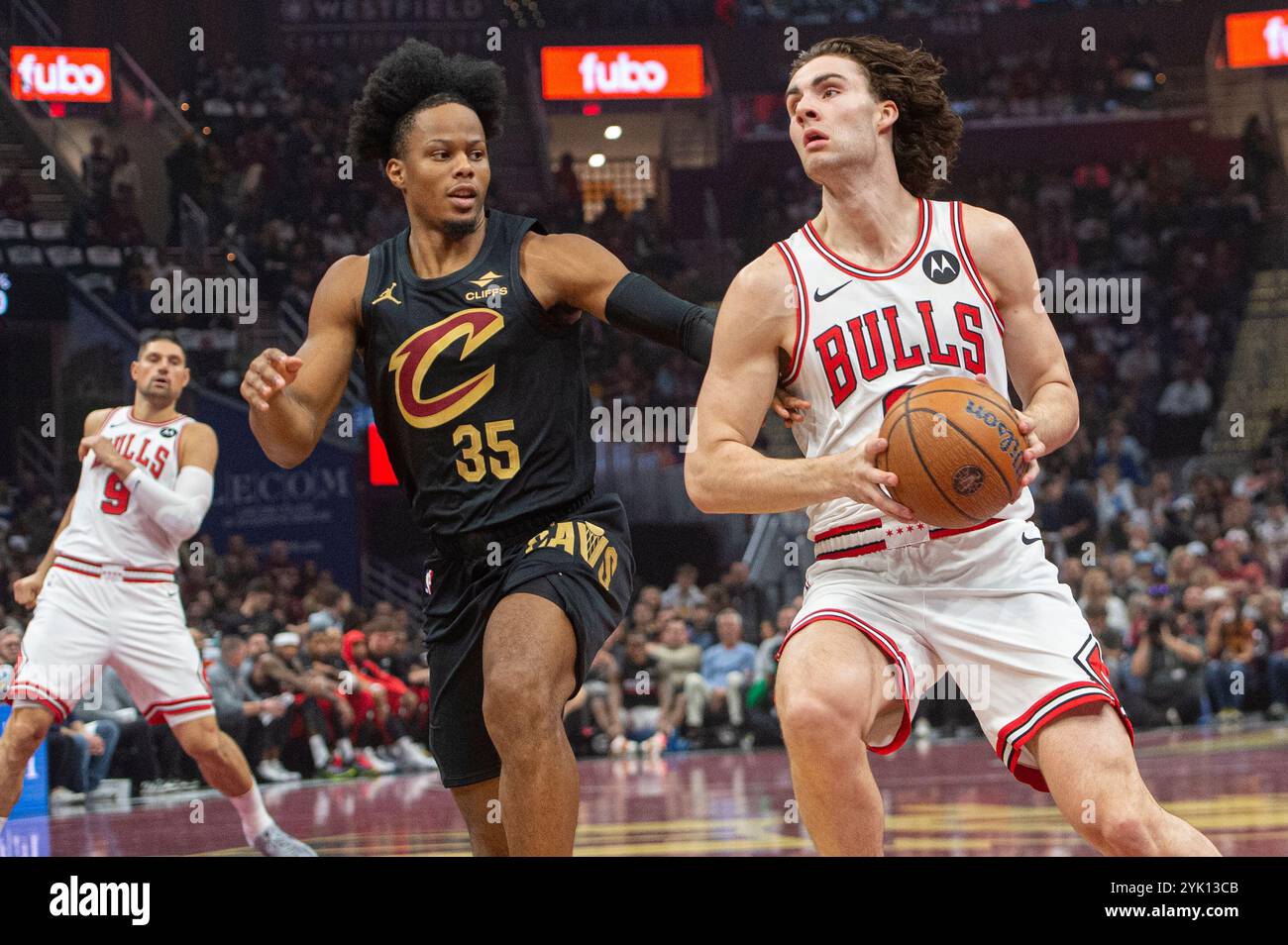 Chicago Bulls' Josh Giddey, drives against Cleveland Cavaliers' Isaac ...