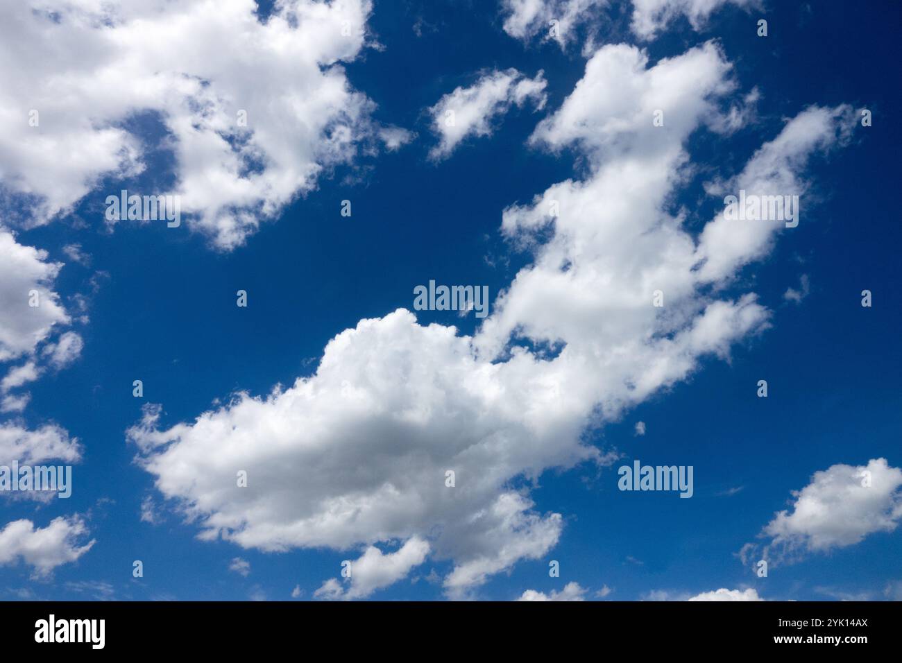 White Clouds Blue Sky Fluffy Flying Stock Photo - Alamy