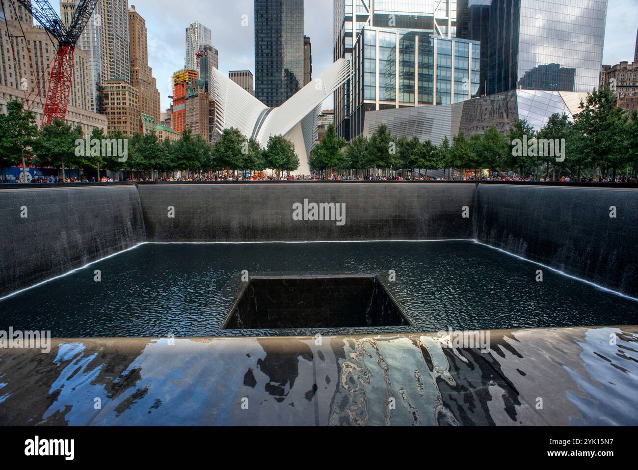 This image depicts the 911 Memorial in New York City, featuring the ...