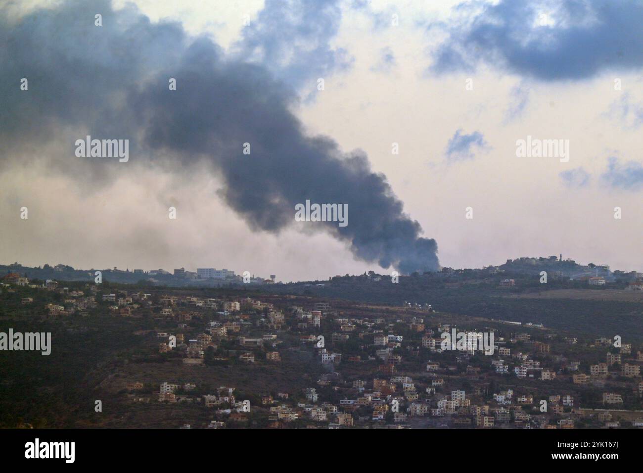 Smoke rises after an Israeli airstrike in the southern village of ...