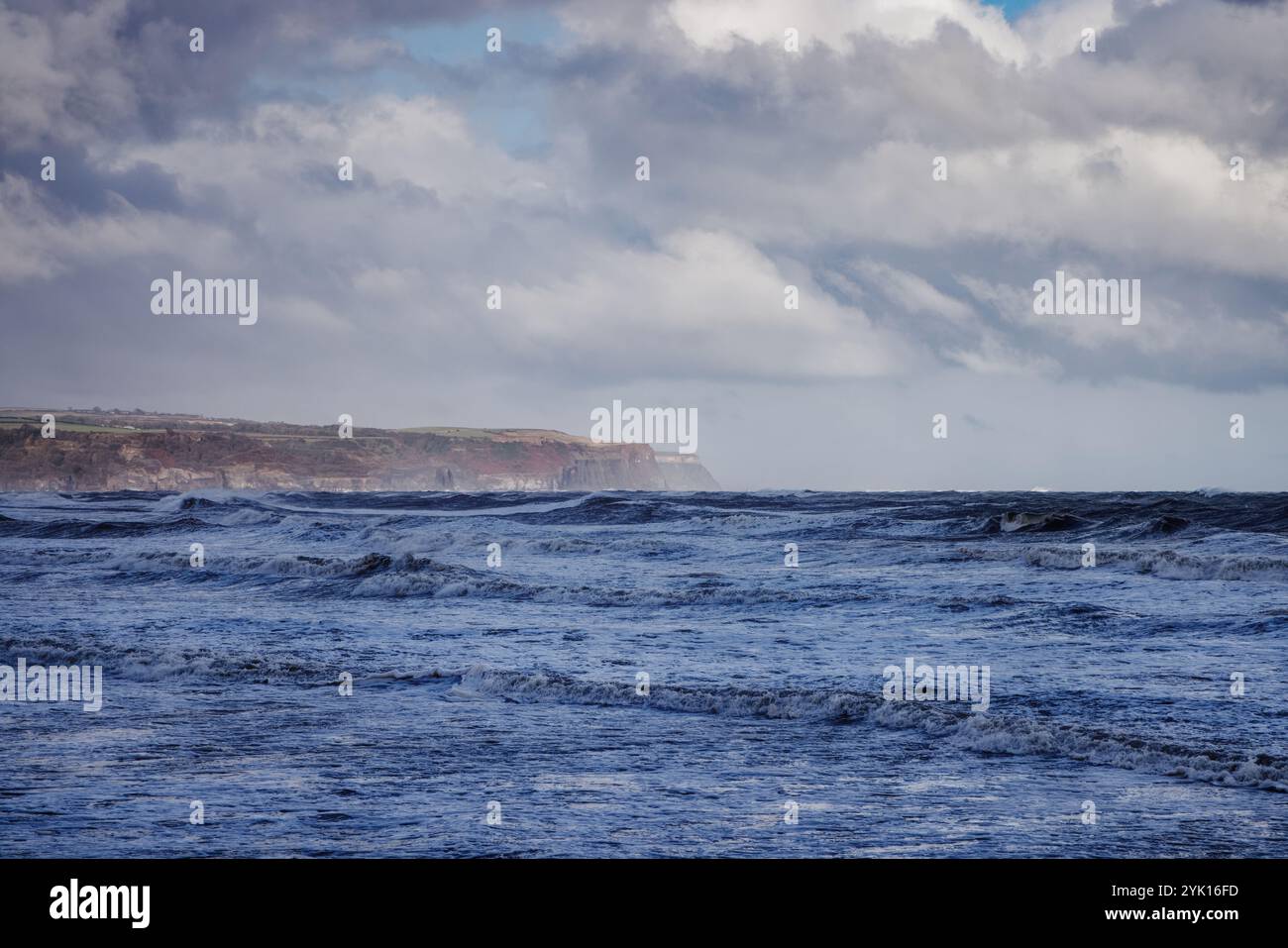 Rough seas at Whitby, looking north Stock Photo - Alamy