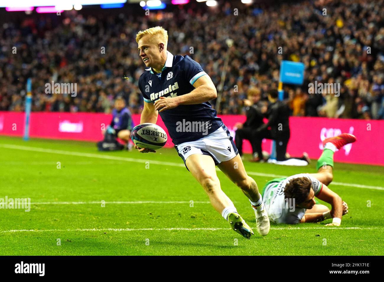 Scotland's Arron Reed scores their side's seventh try of the game ...
