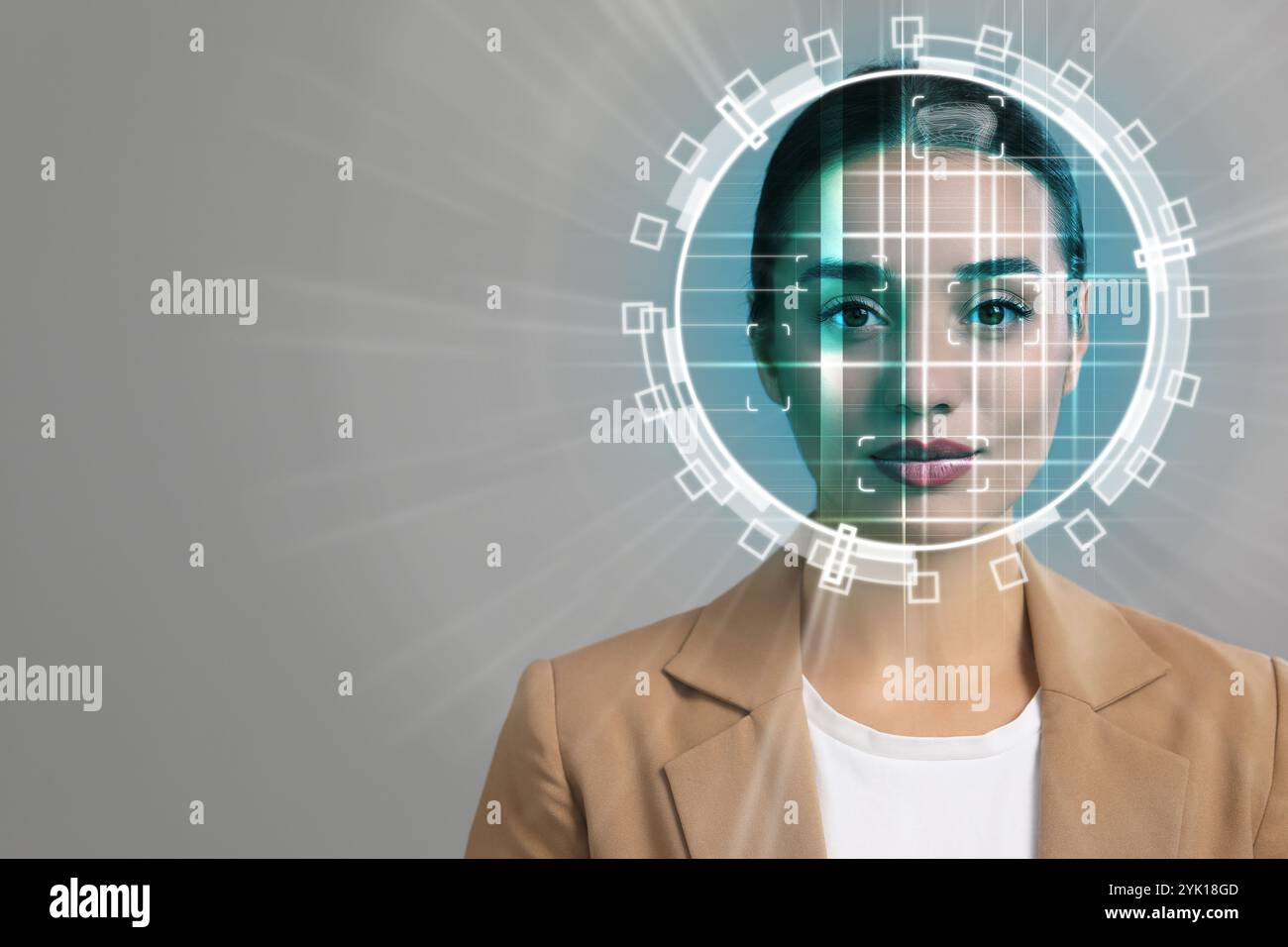 Facial recognition system. Woman undergoing biometric verification on ...
