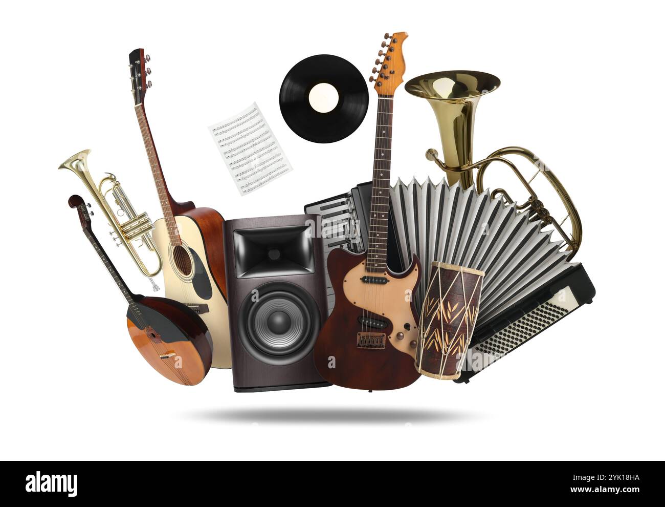 Different musical instruments in air on white Stock Photo - Alamy