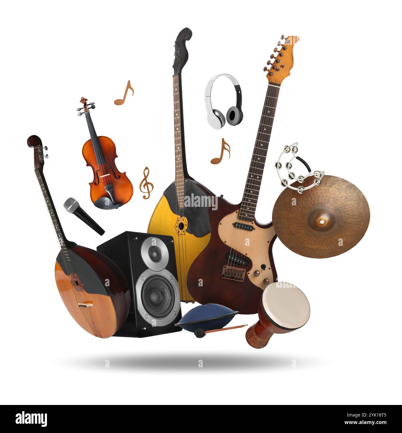 Different musical instruments in air on white Stock Photo - Alamy