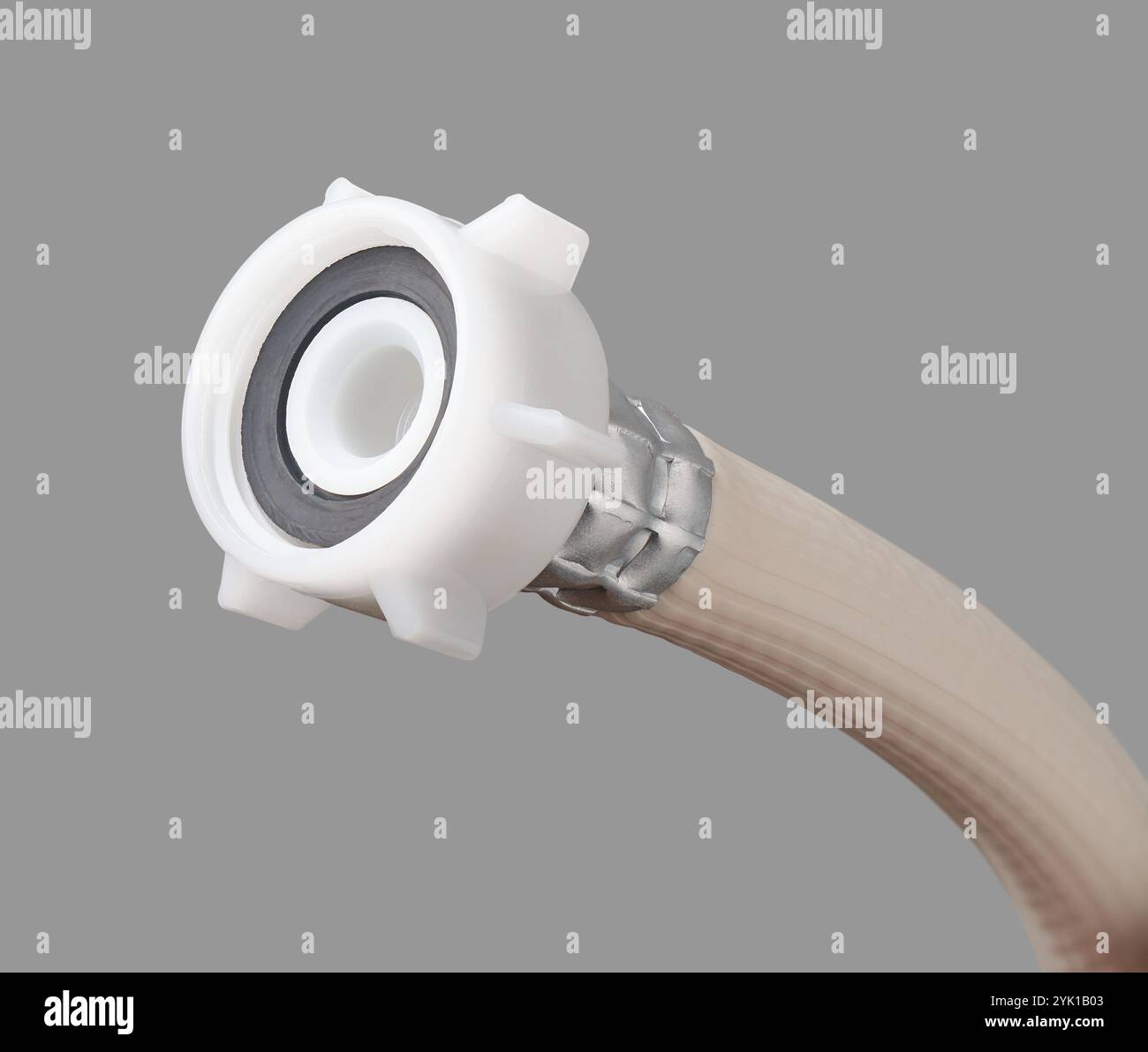 close-up of threaded connector of flexible inlet hose used in washing ...