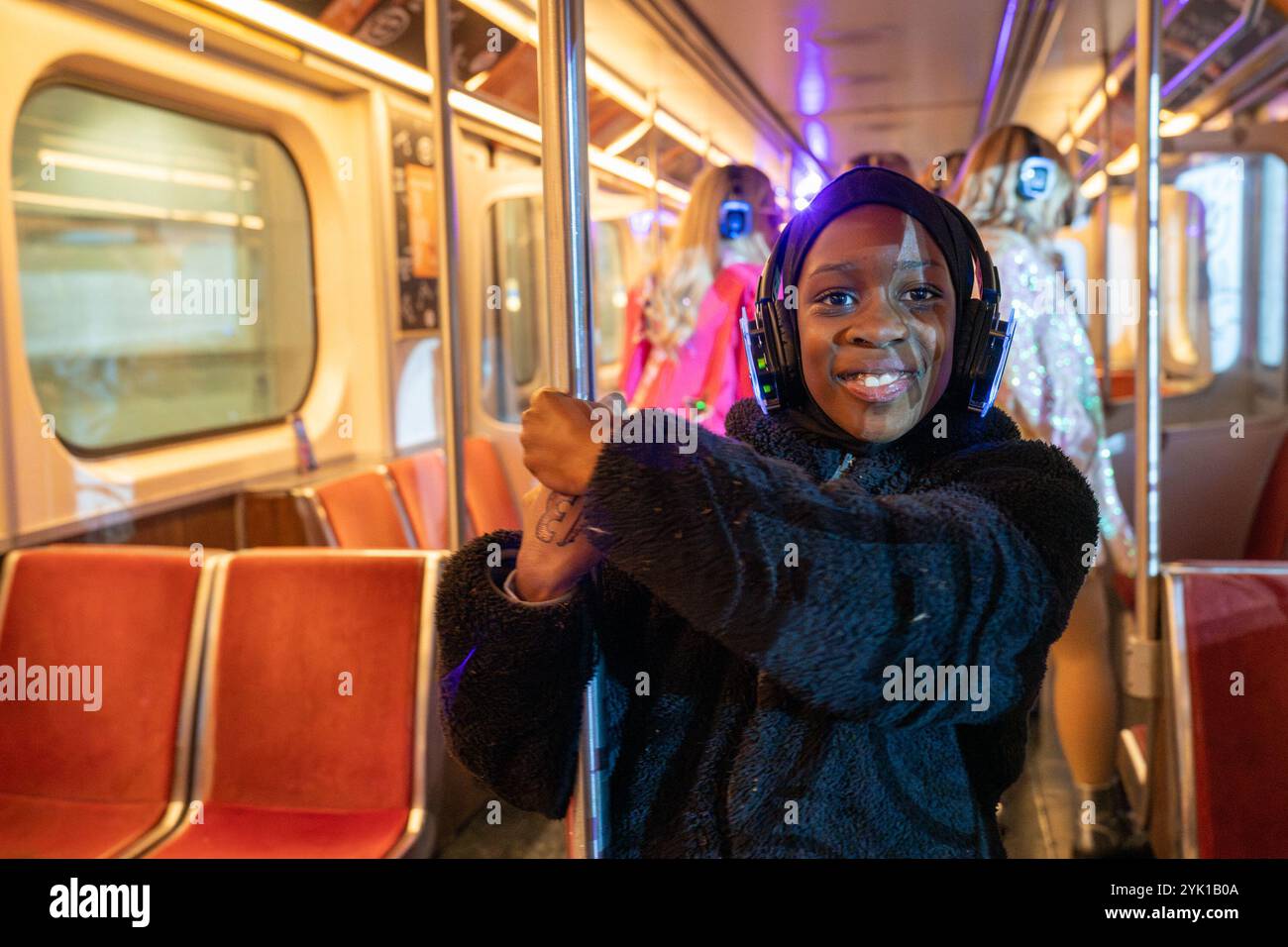 People dance at silent dance party on TTC (Toronto Transit Commission) subway train Stock Photo ...