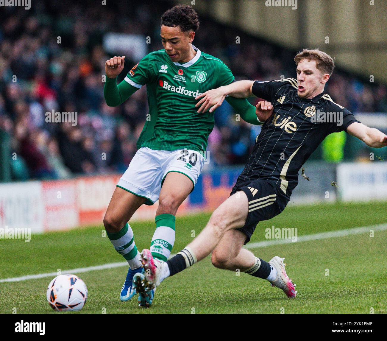 Pedro Borges of Yeovil Town and Tom Pugh of Halifax Town during the ...