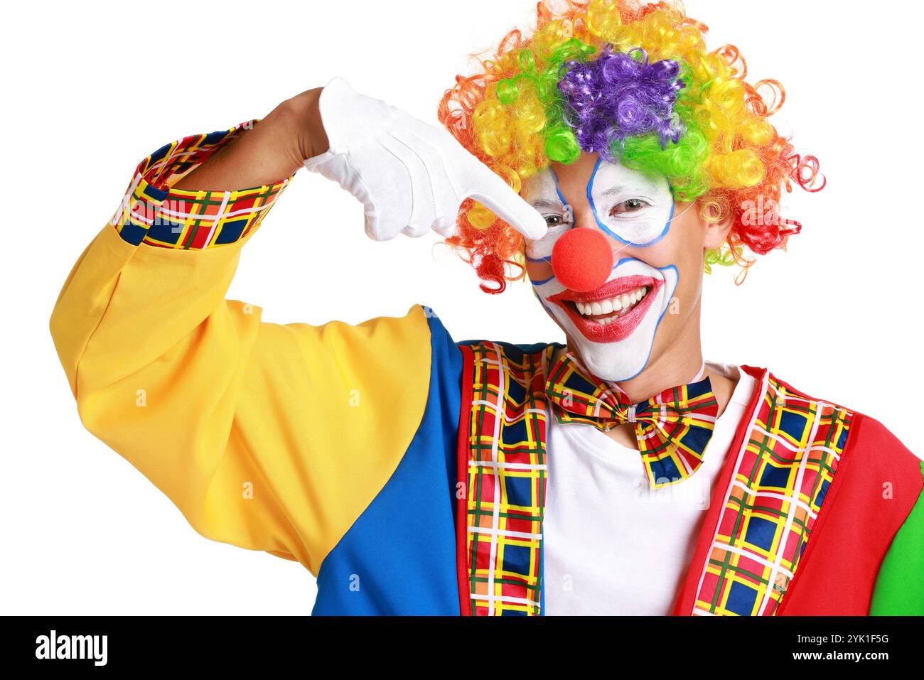 Portrait of happy clown pointing at his nose on white background Stock ...
