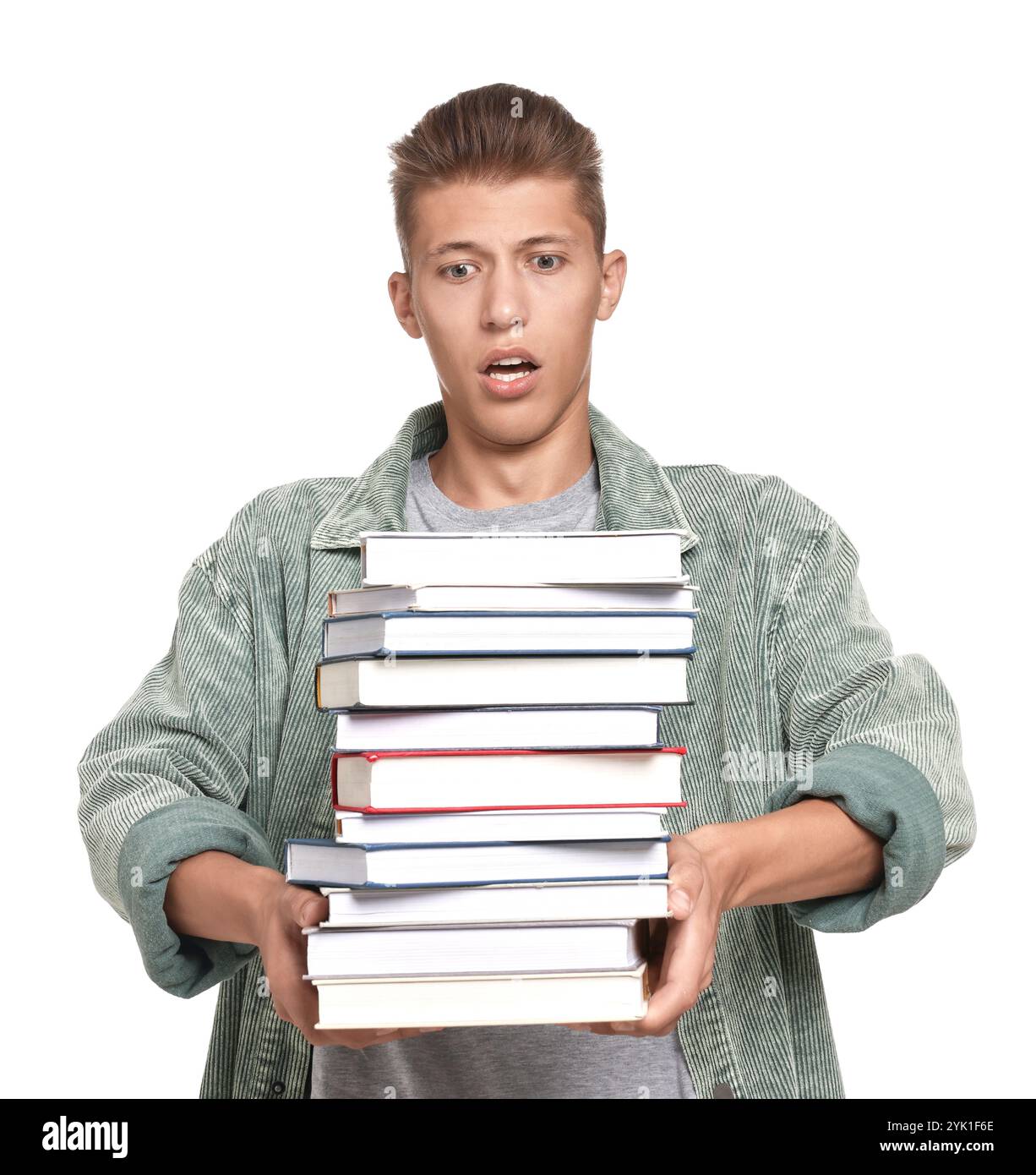 Emotional student with stack of books having stress before exam on ...