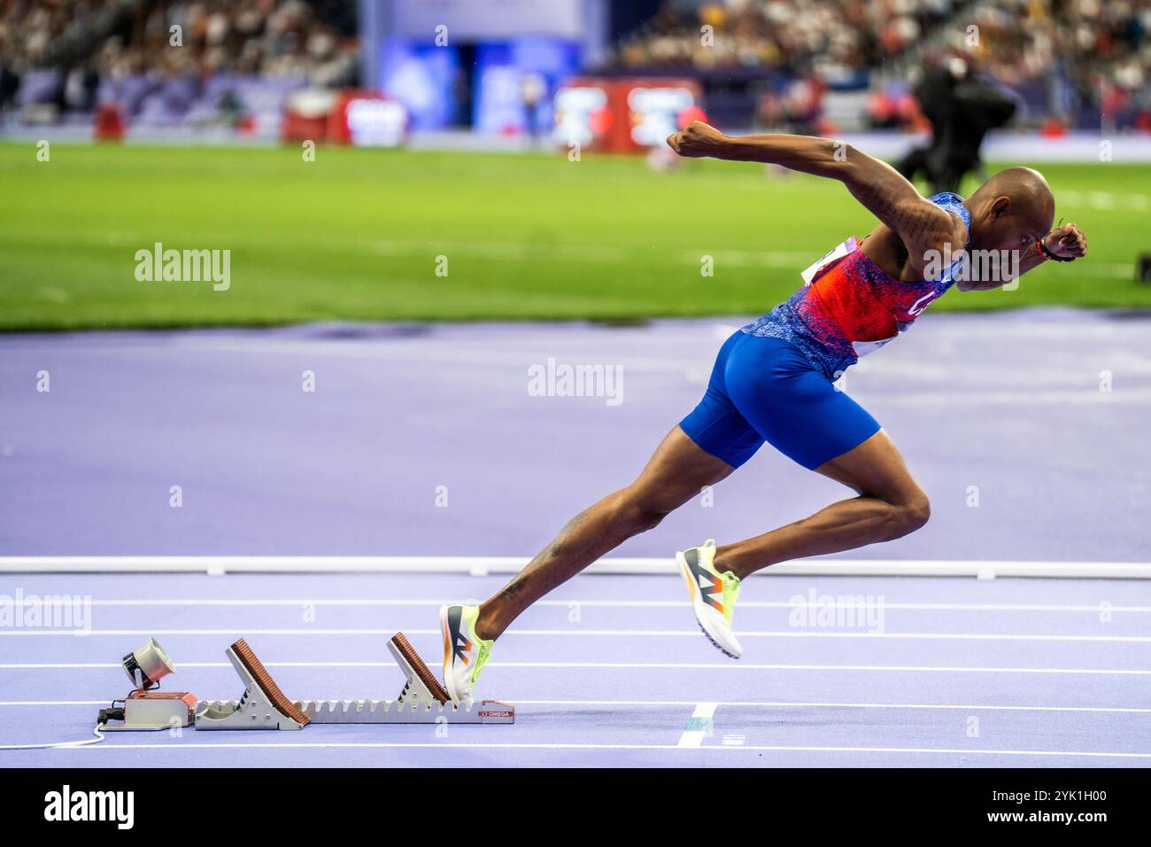 Runner starting out of the blocks at the 2024 Olympic Summer Games ...