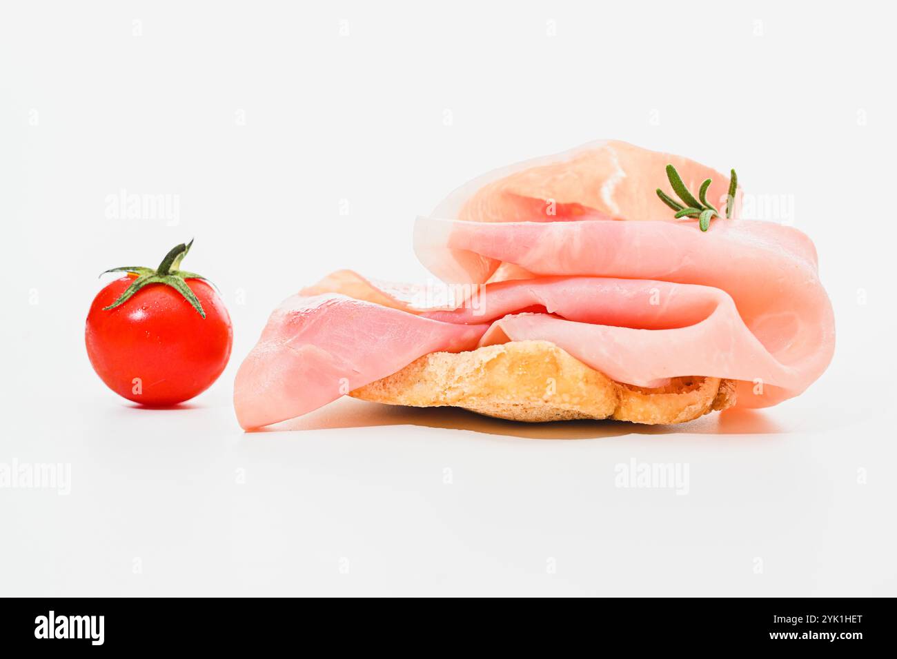 Prosciutto cotto or cooked ham in Italy on white background Stock Photo ...