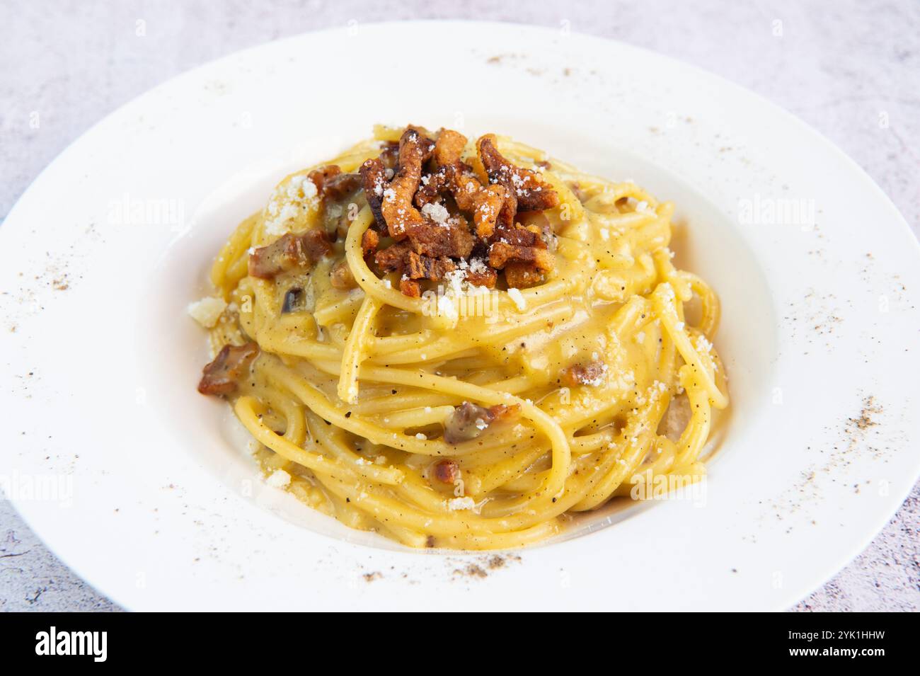 Pasta alla carbonara is the name of a type of pasta cooked with pork ...