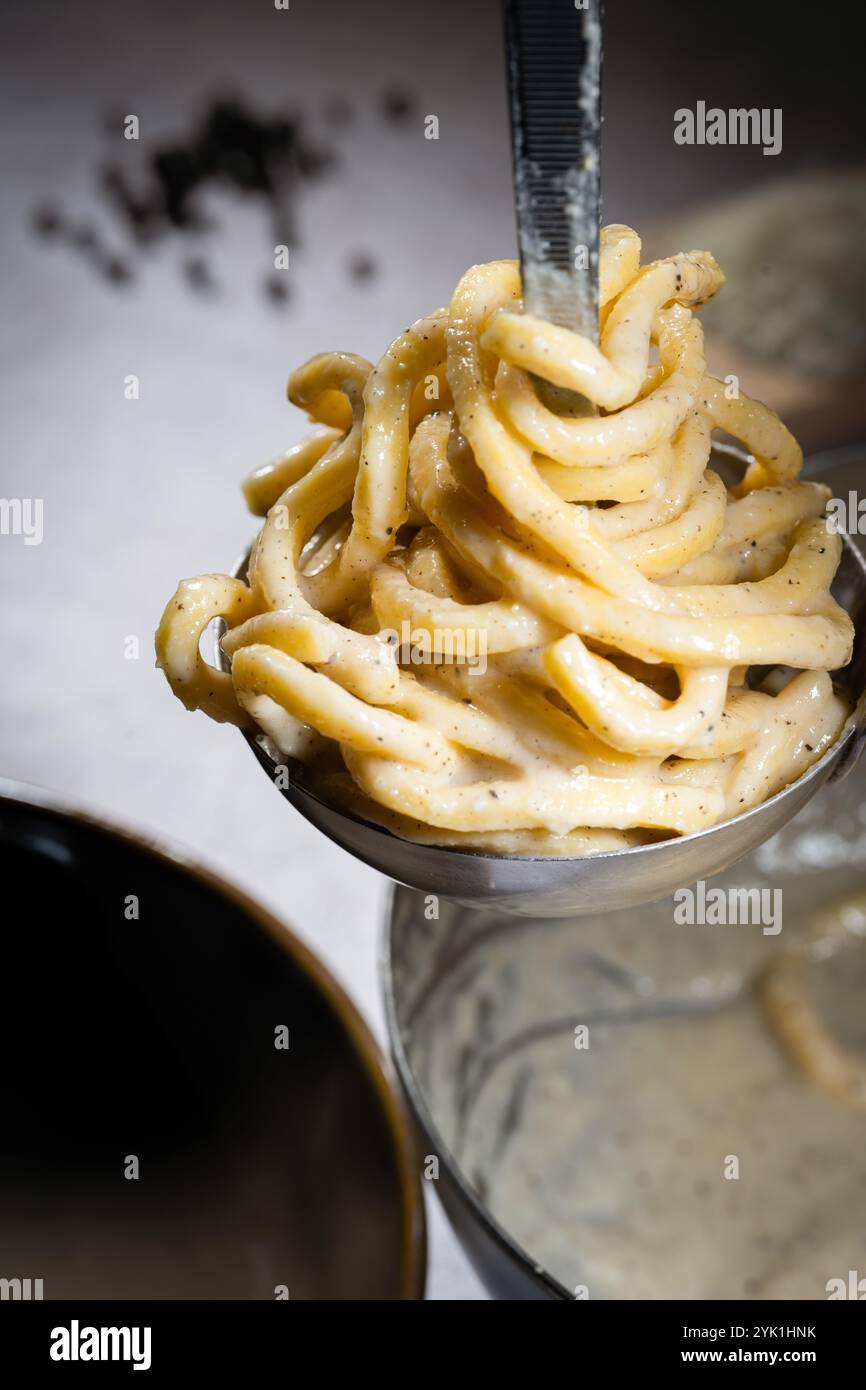 cacio e pepe is the name of a type of pasta cooked and sautéed with ...