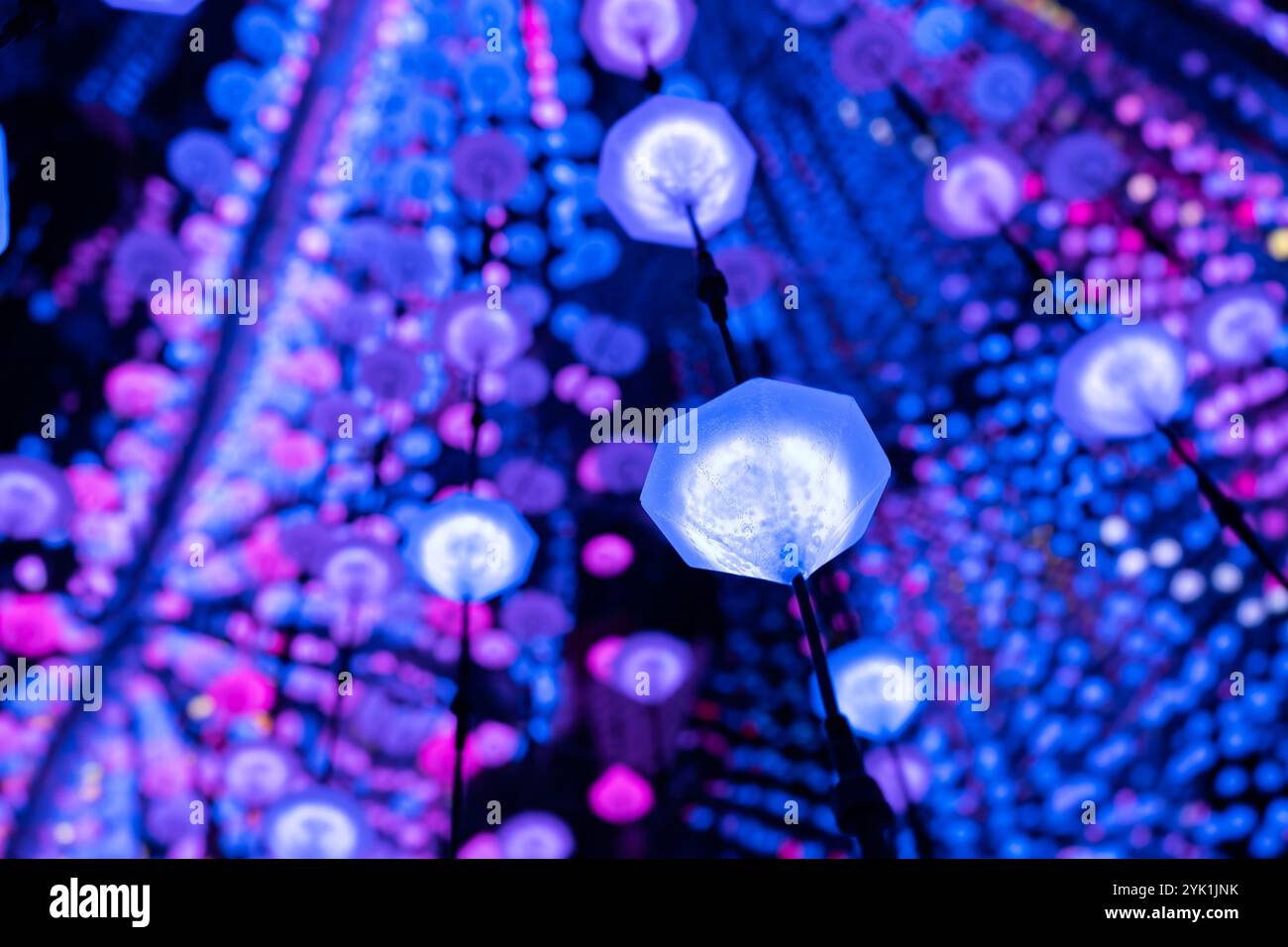 Symmetrical glowing blue lights Stock Photo - Alamy