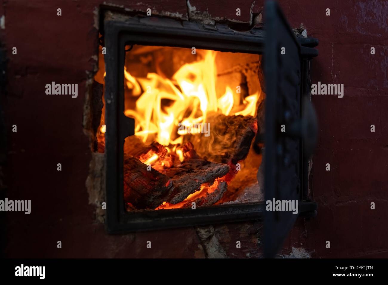 Fire burns in stove orange hi-res stock photography and images - Alamy