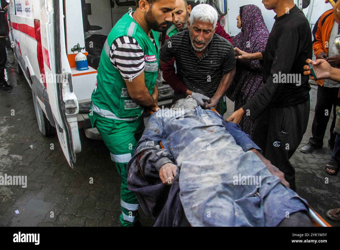 Middle East news. Palestinians bleed from their wounds after being ...