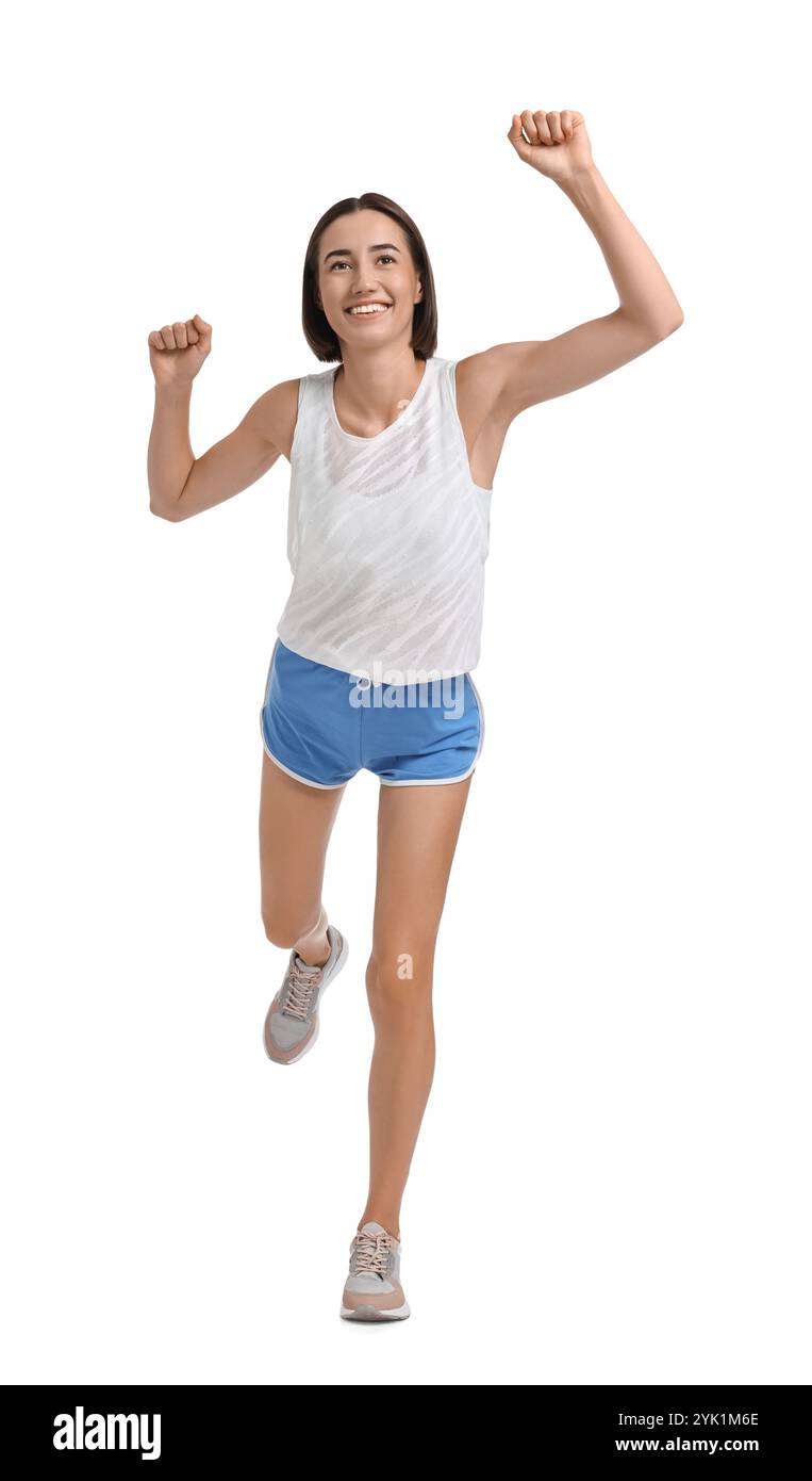 Beautiful woman in sportswear running on white background Stock Photo ...