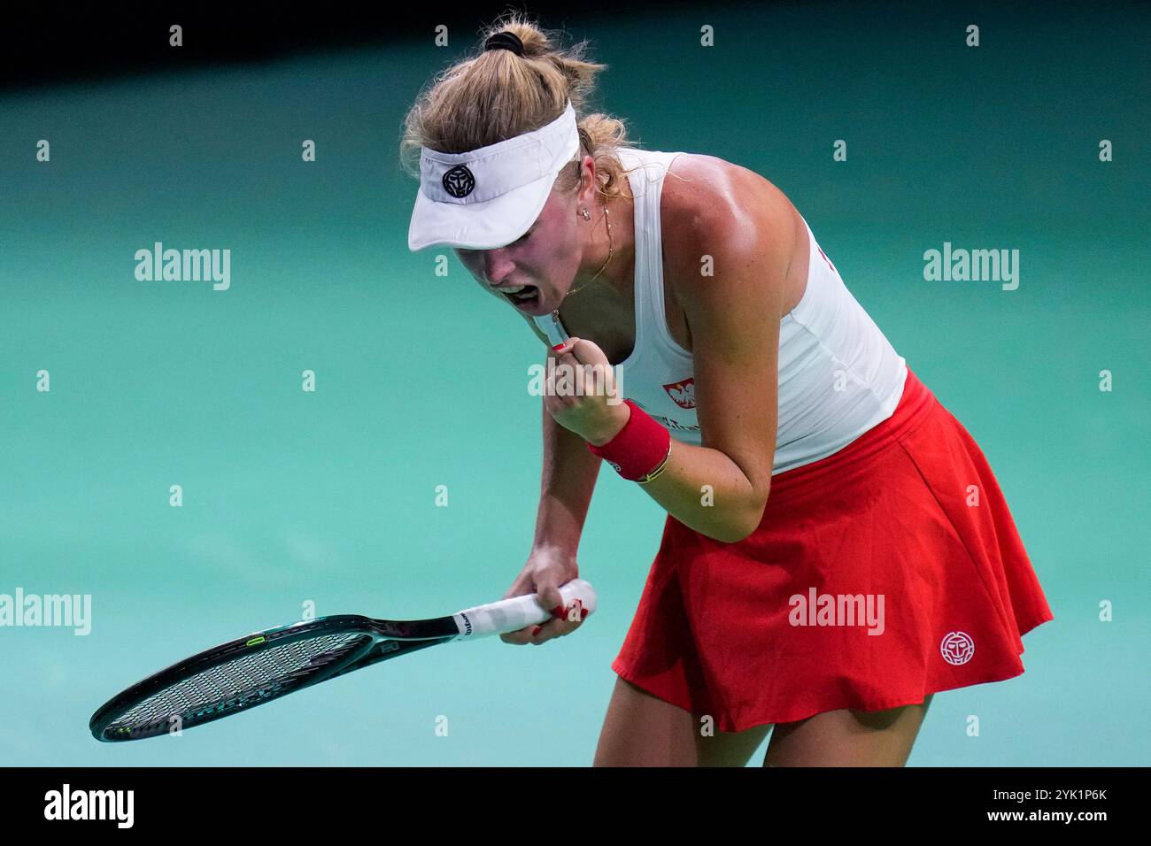 Poland's Magdalena celebrates a point against Marie Bouzkova of the ...