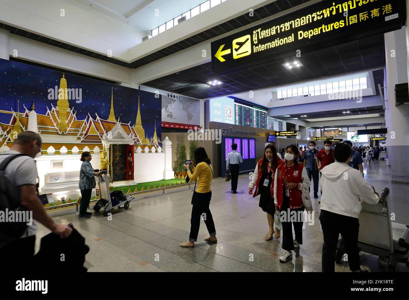 Bangkok, Thailand - June 29, 2023: Passengers, some wearing face masks ...
