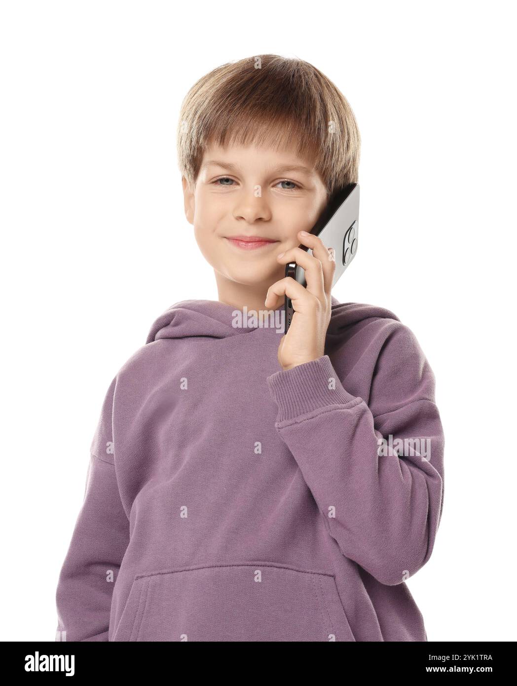 Cute little boy talking on smartphone against white background Stock ...
