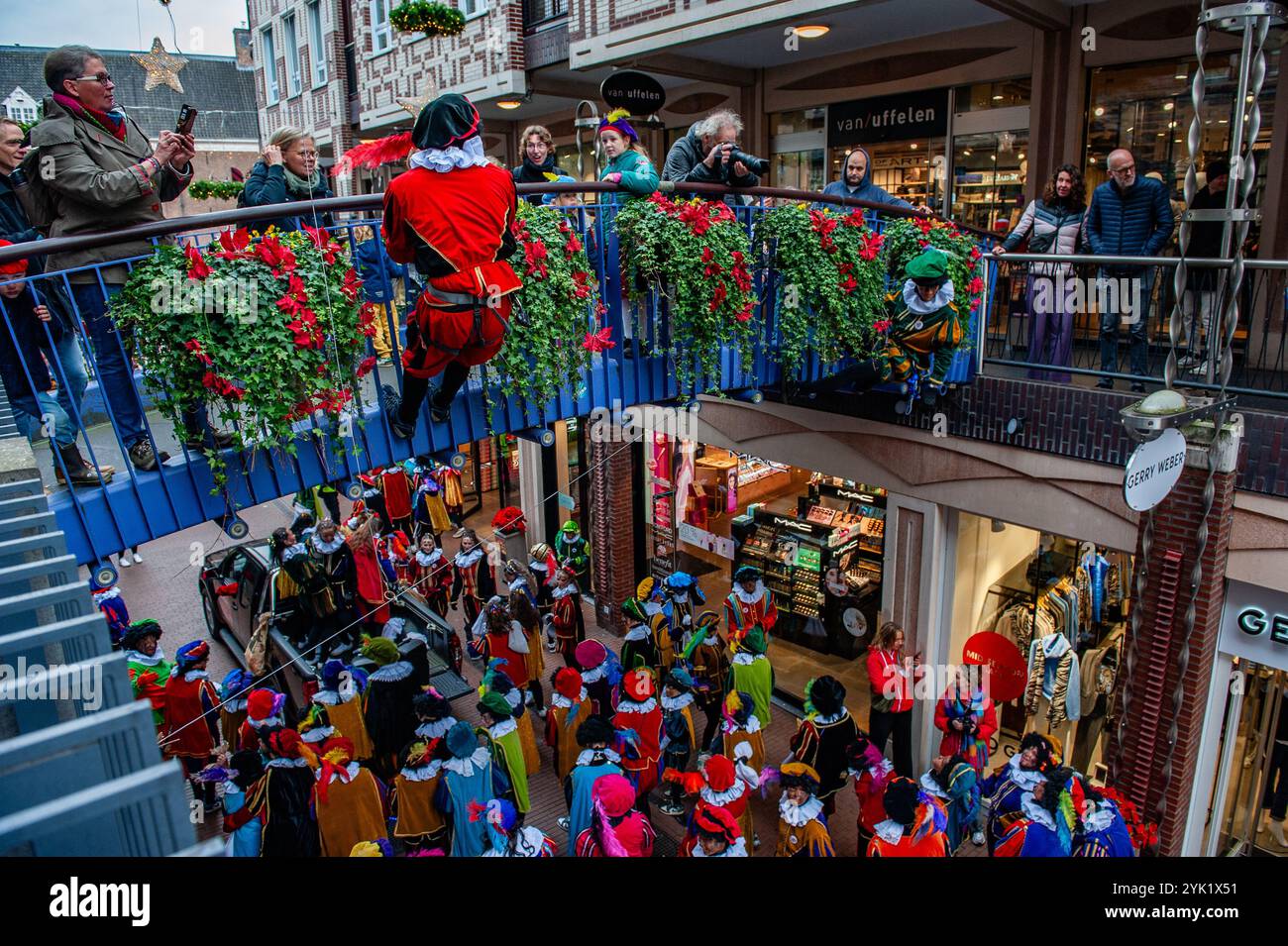Some helpers are seen climbing the bridges to cheer the audience. On ...