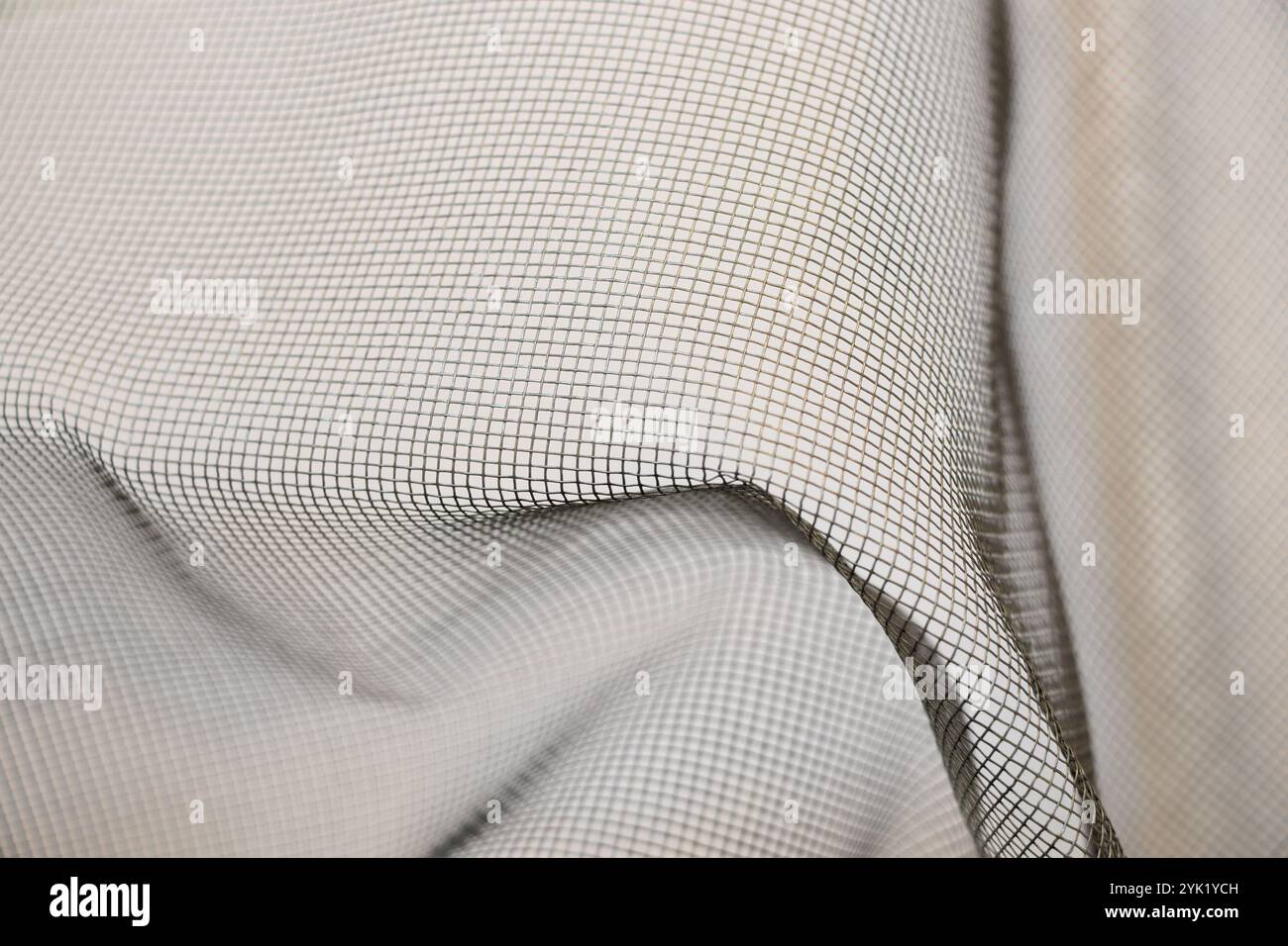 Curved mesh close up as ofn,mosquito black mesh on white background ...
