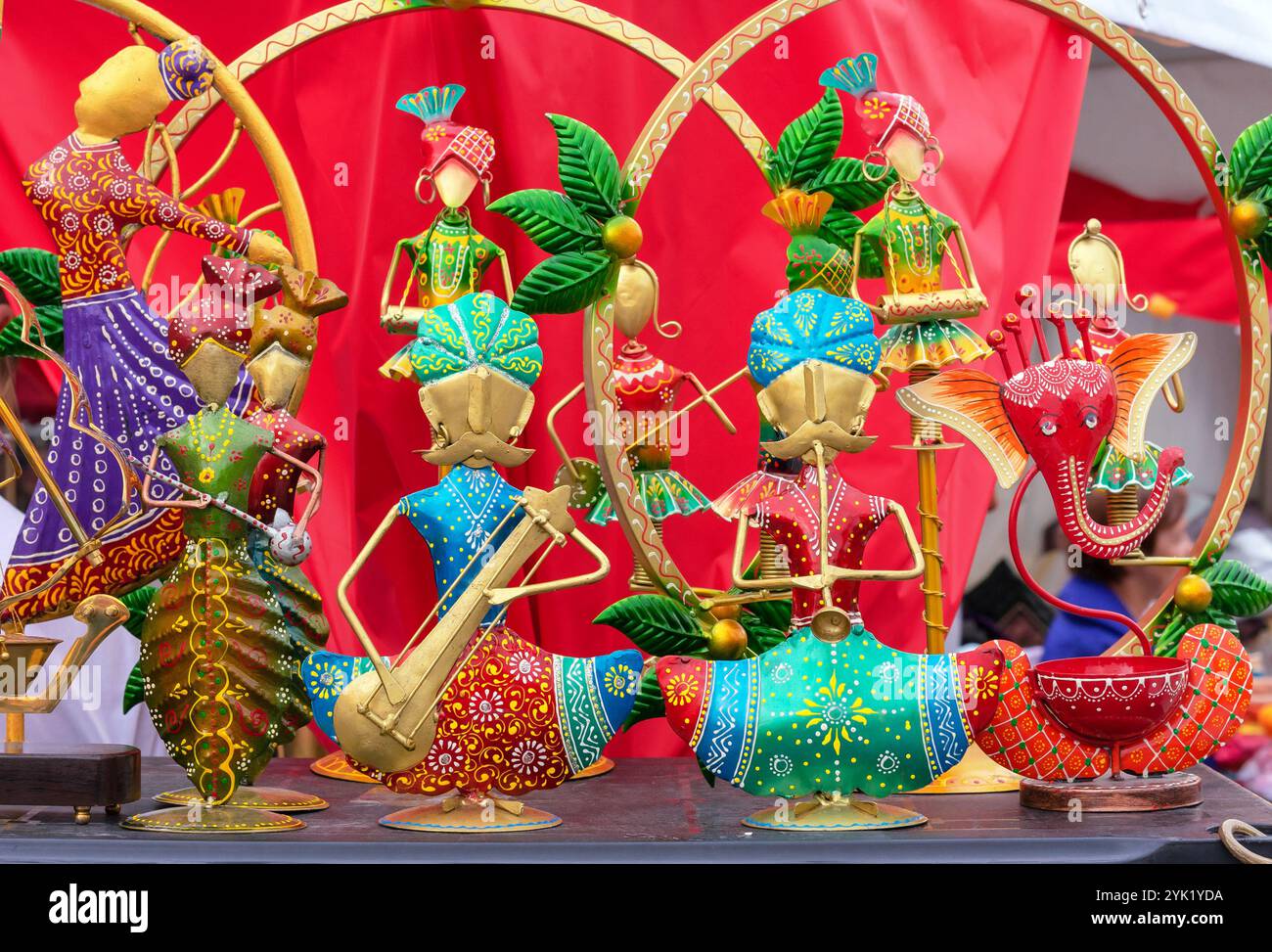 Figures of Indian musicians in national costumes playing musical ...