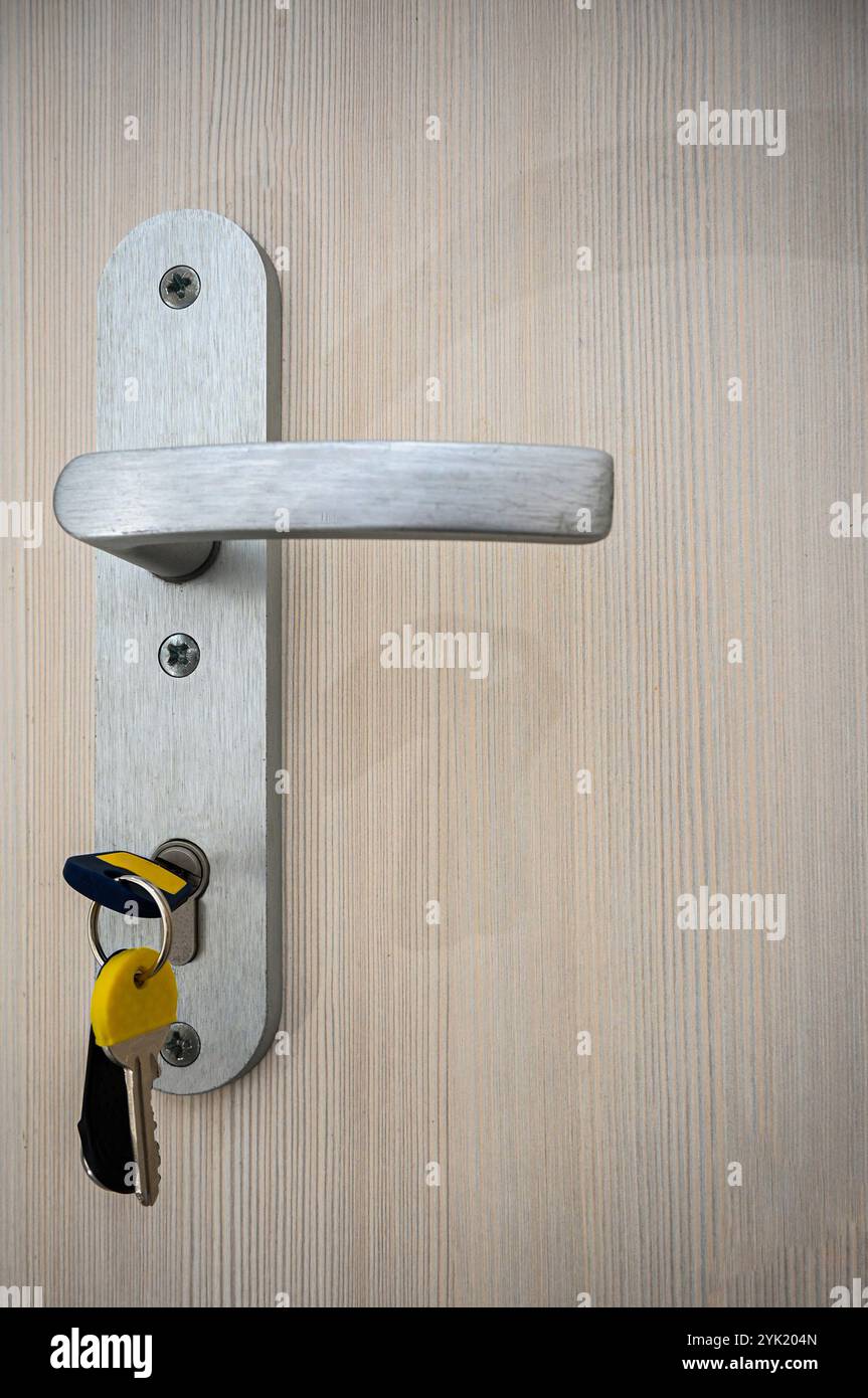 House key in door keyring hi-res stock photography and images - Alamy