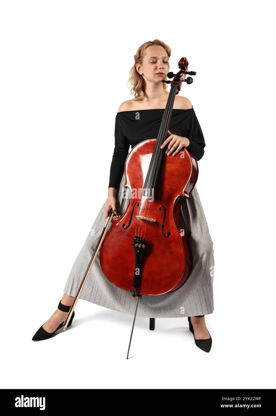 Young woman playing on classical Cut Out Stock Images & Pictures - Alamy