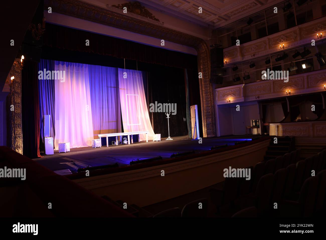 Different furniture and other decor on stage in theatre Stock Photo - Alamy