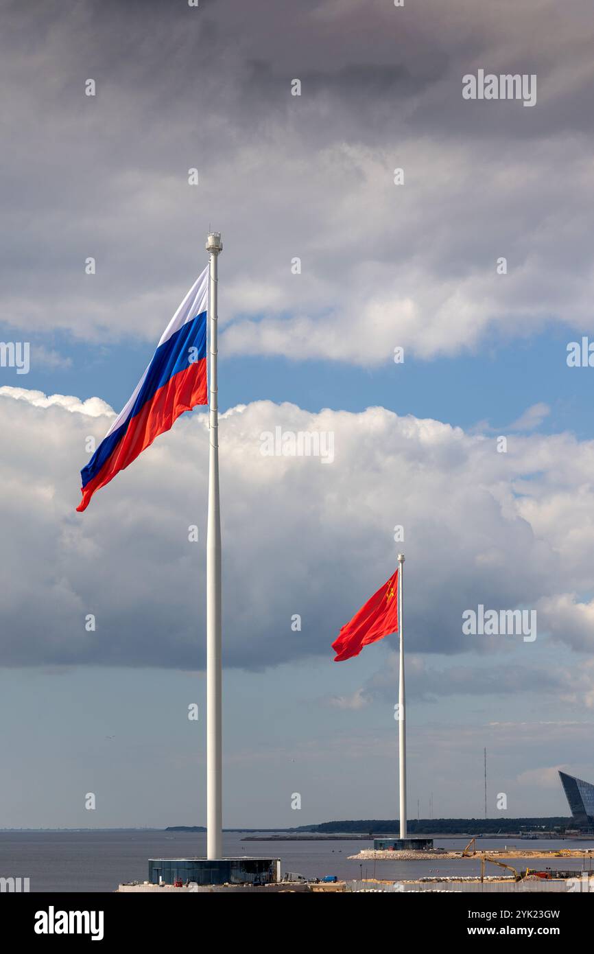 Historical flags of USSR and State Flag of Russian Federation is flying ...
