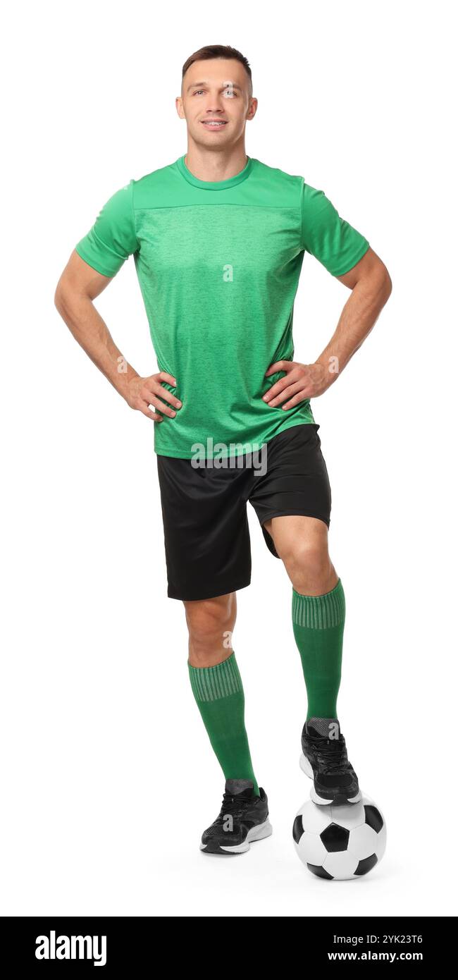 Smiling football player with soccer ball on white background Stock ...