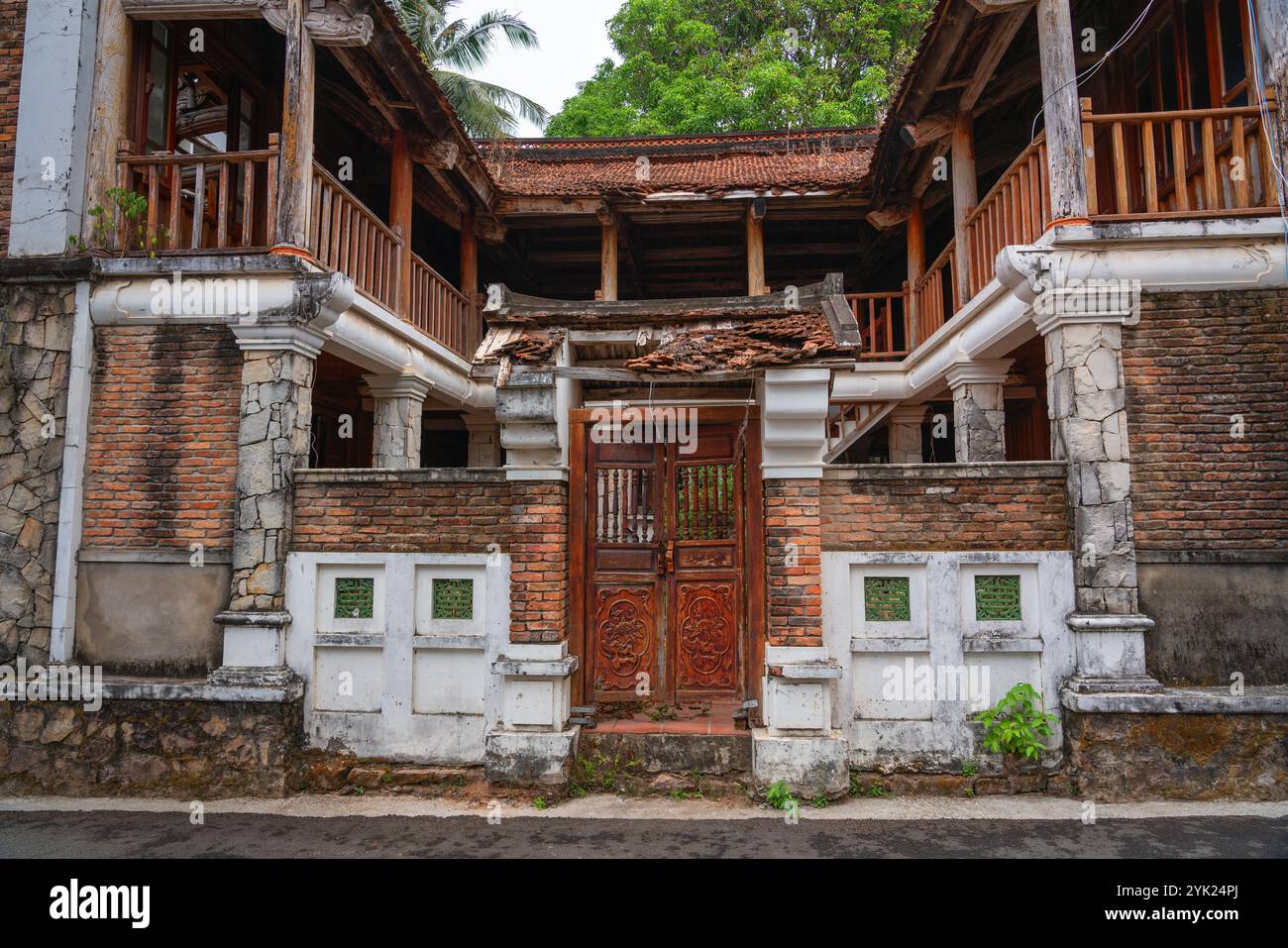 An old ruined Asian-style house in Vietnam Stock Photo - Alamy