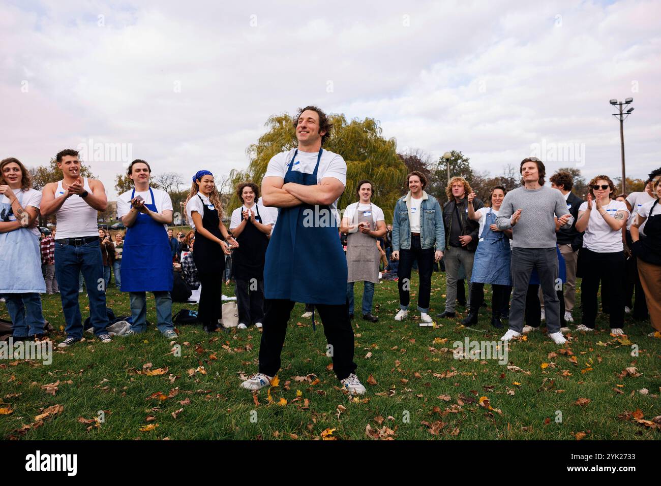 The winner, Ben Shabad stands in front to cheers while attendees vote ...