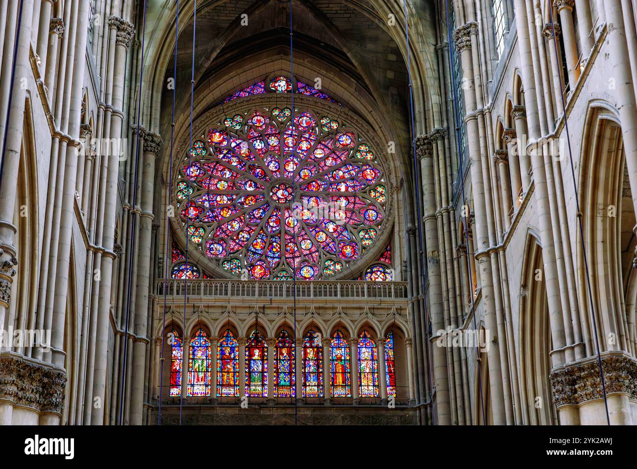 Interior of the cathedral with rosette and stained glass windows ...