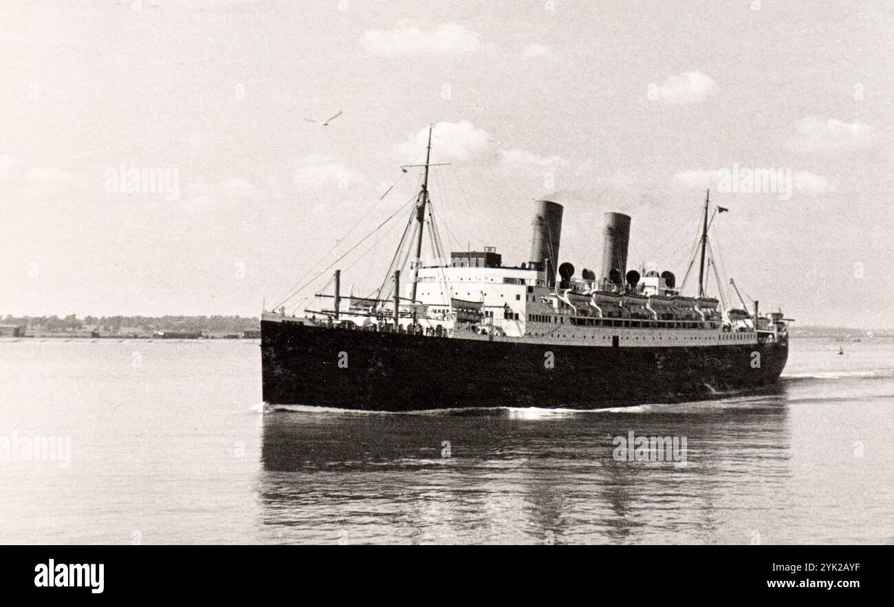 A beautiful two smokestaks ship sailing out from Southampton harbor in ...