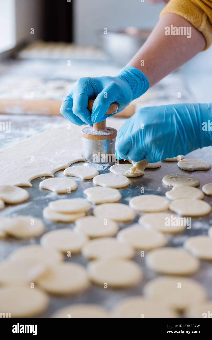 Preparing dough circles for traditional dumplings, showcasing handmade ...