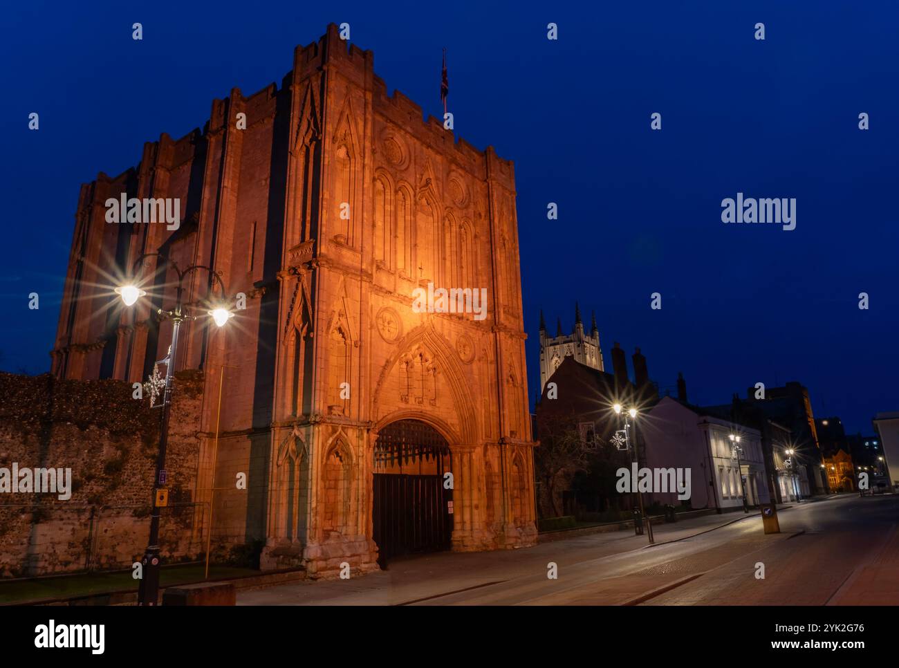 The illuminated Abbey Gate is the entrance to the Abbey Gardens in Bury ...