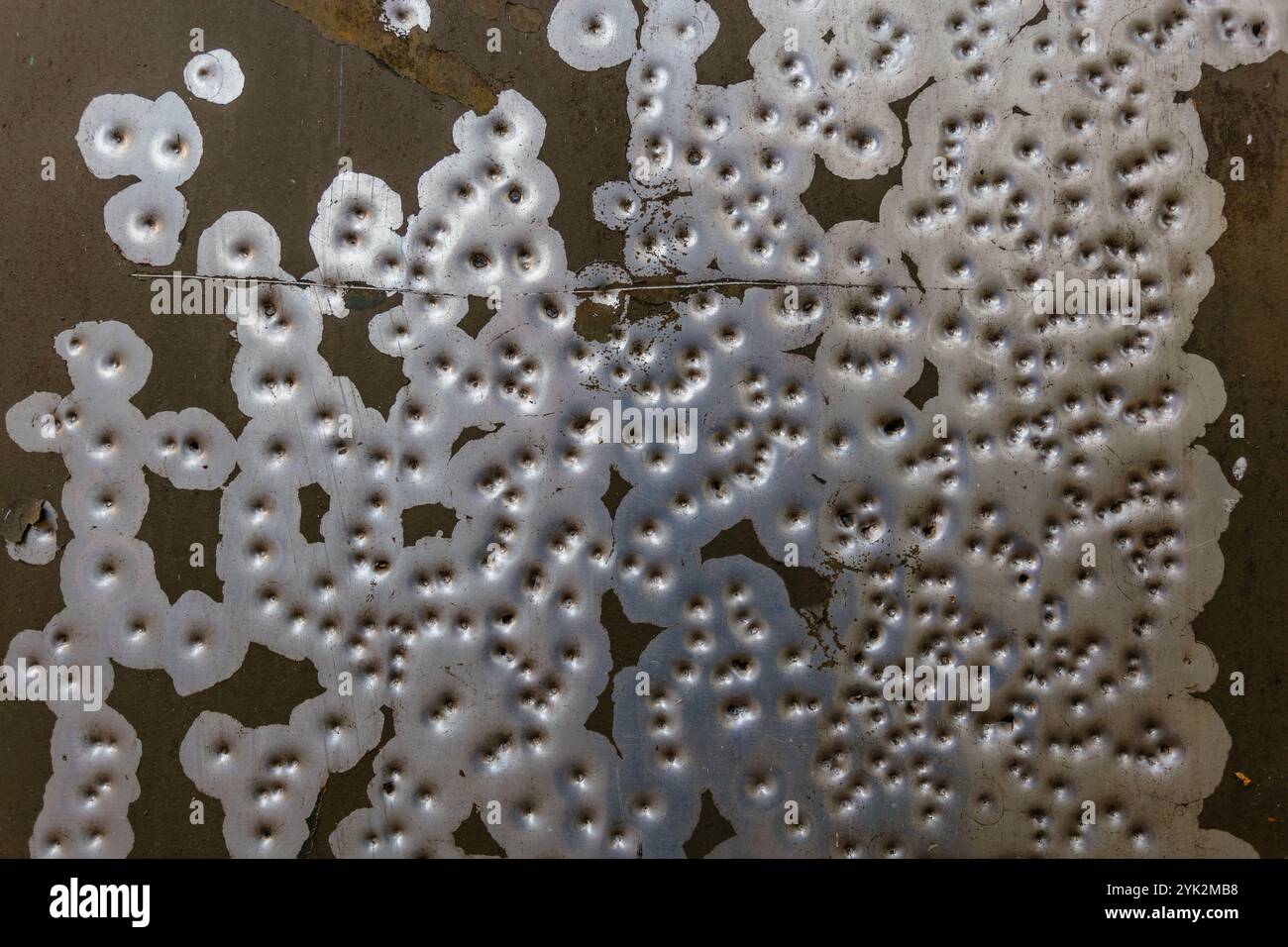 Marks of bullets on military vehicle body Stock Photo - Alamy