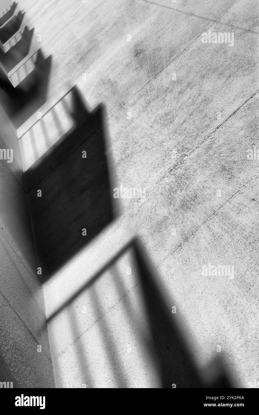 The interplay between shadow and light on a walled structure captures ...