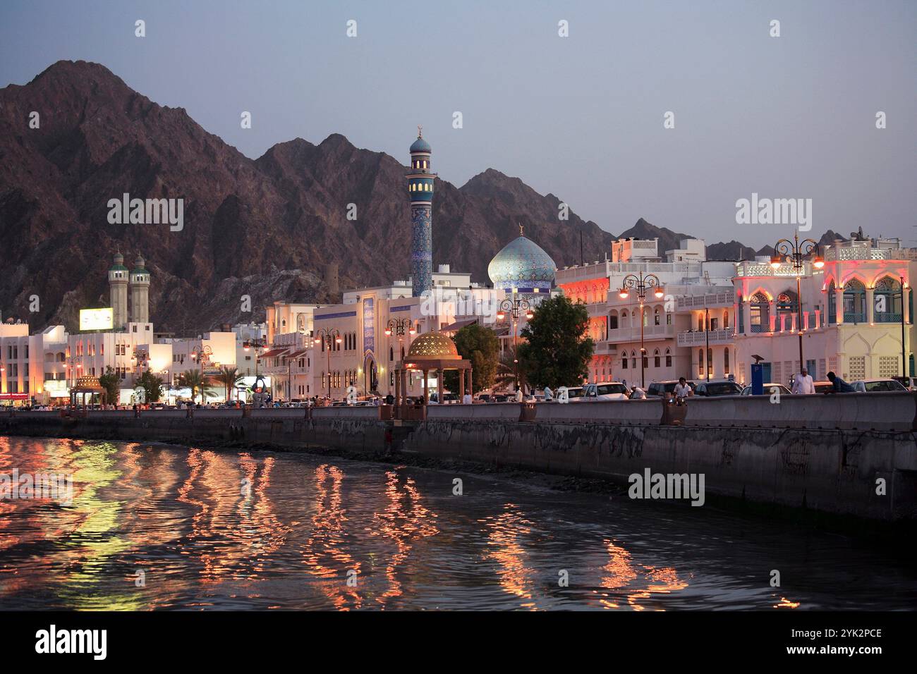Oman, Muscat, Mutrah, skyline at dusk Stock Photo - Alamy