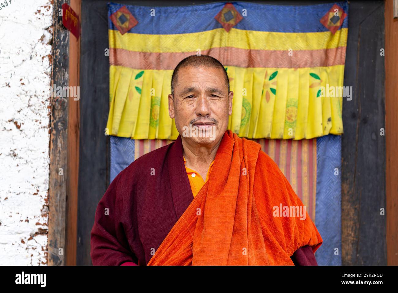 The head monk of Lungchutse Temple, which is located at an elevation of ...