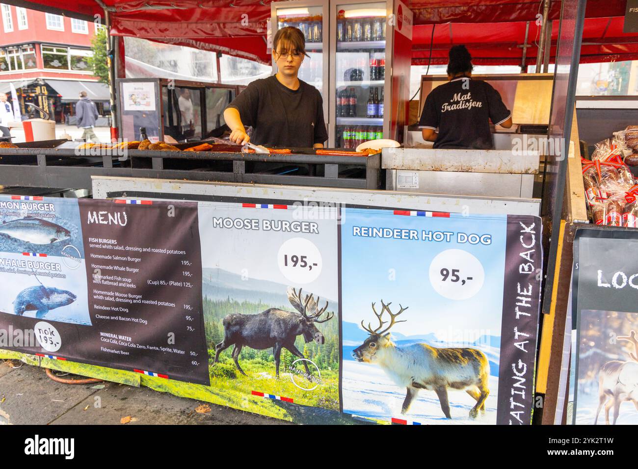 Food market stall in Bergen Norway, lady cooking offers Reindeer hot ...