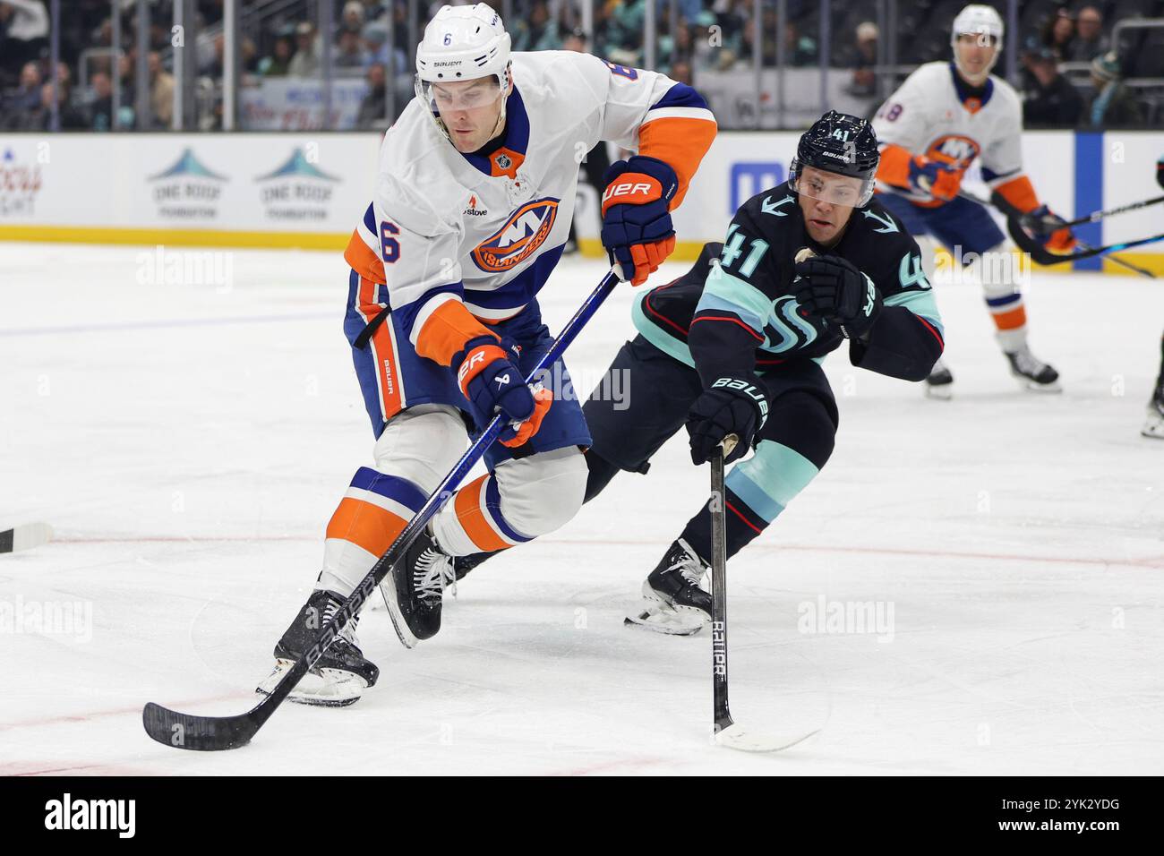 New York Islanders defenseman Ryan Pulock (6) moves the puck against ...